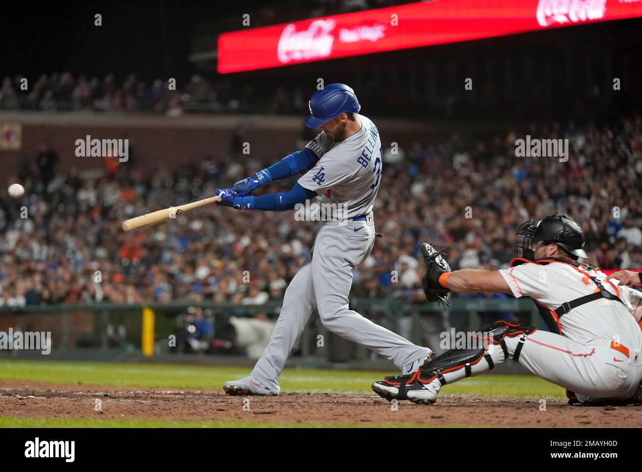 Los Angeles Dodgers' Cody Bellinger hits an RBI triple in front of San ...