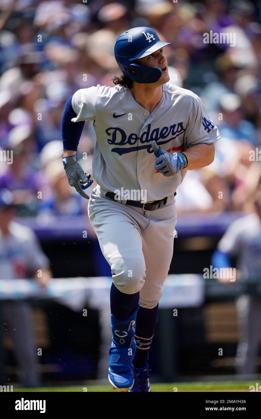 Los Angeles Dodgers' James Outman follows the flight of his two-run ...