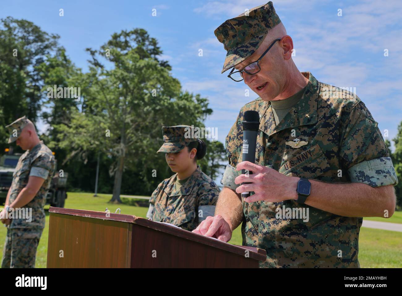 A U.S. Navy Chaplain, Cmdr. Michael O'Bannon gives an invocation during ...