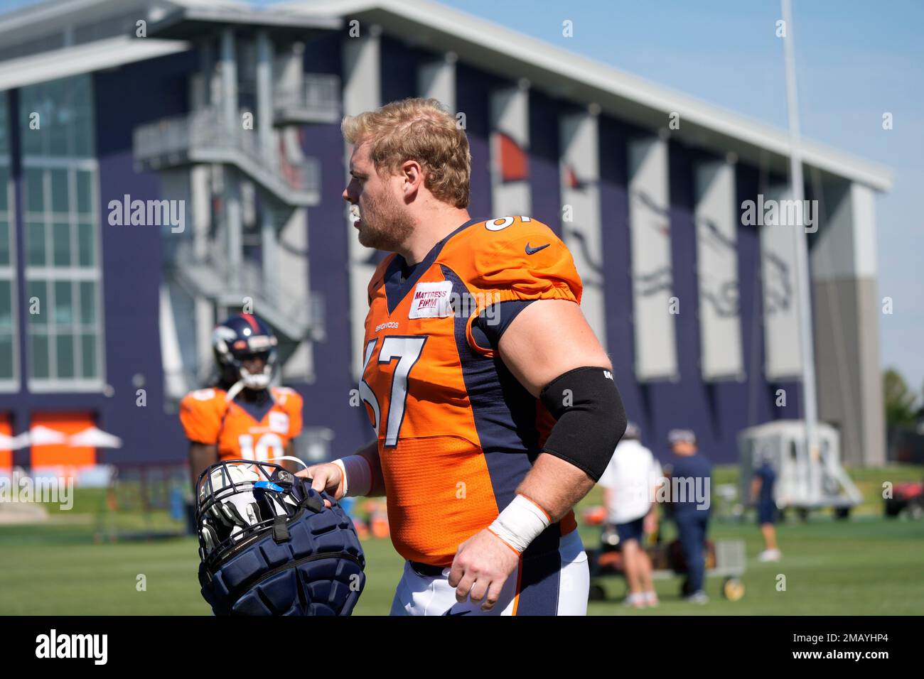 Denver Broncos guard Michael Niese takes part in drills during the NFL ...