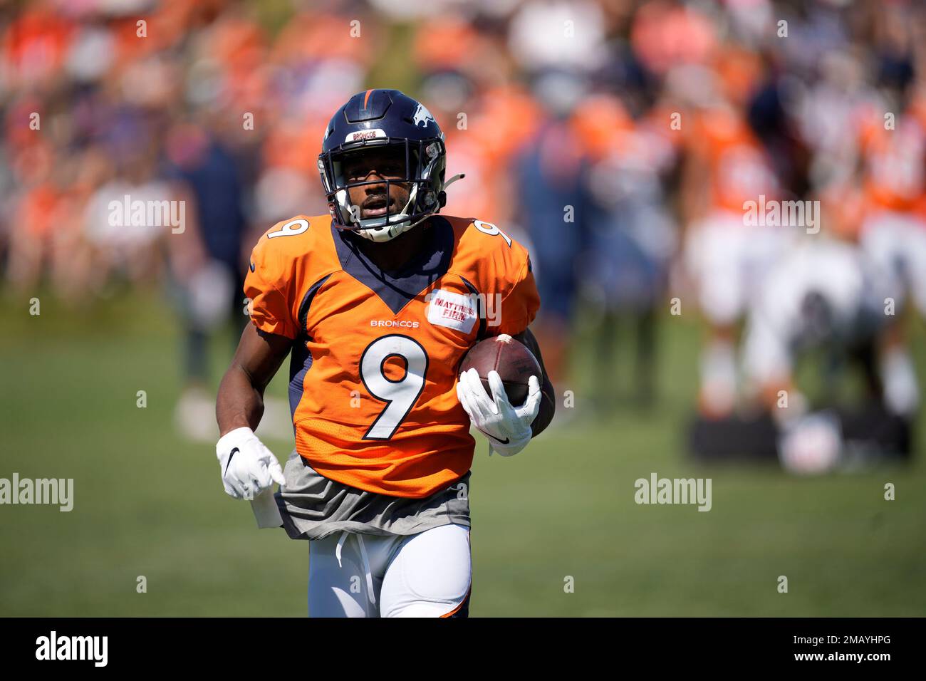 Denver Broncos wide receiver Kendall Hinton takes part in drills during ...