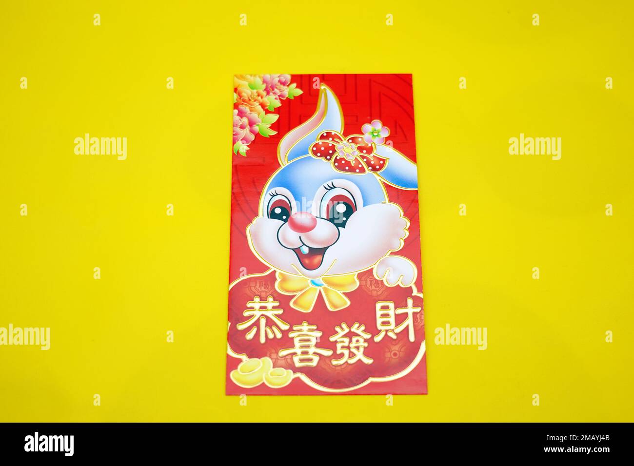 Theme red envelopes with rabbit, Chinese blessing words on yellow ...