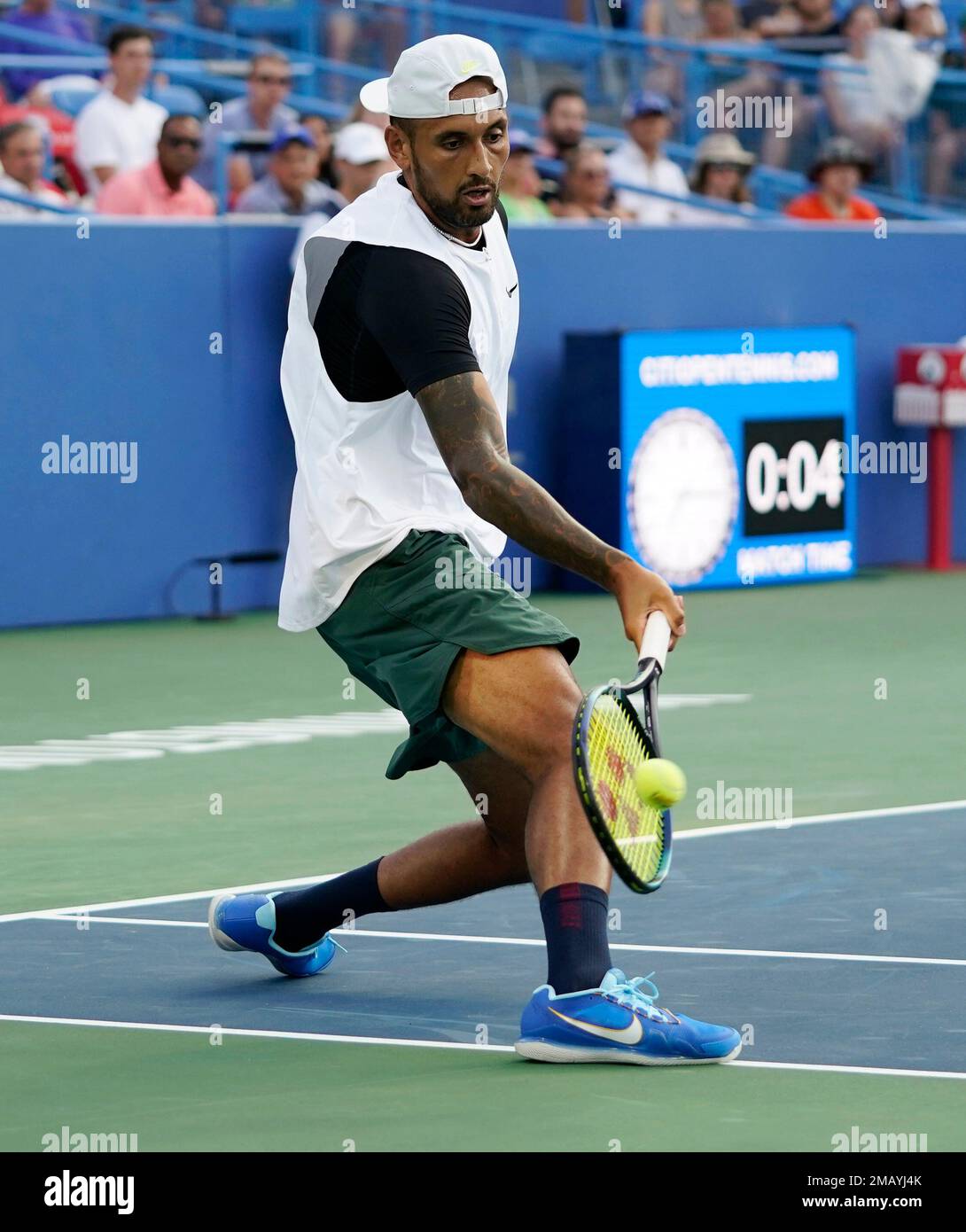 Nick Kyrgios, of Australia, returns to Marcos Giron, of the United ...