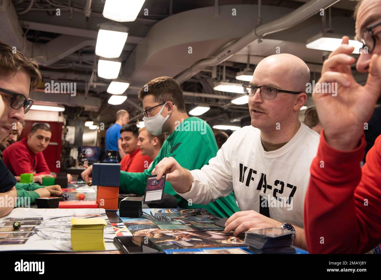 220608-N-UF592-1052 PHILIPPINE SEA (June 8, 2022) Sailors play Magic ...