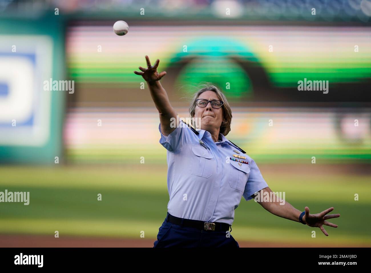 U.S. Coast Guard Commandant Adm. Linda Fagan throws out a ceremonial ...