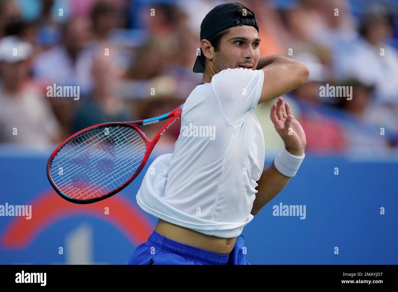 Marcos Giron, of the United States watches his return to Nick Kyrgios ...