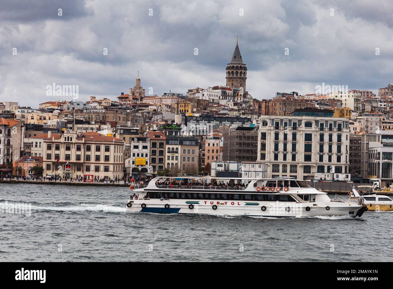 Cityscape of Istanbul. Old city with colored buildings. Eminonu ferry ...