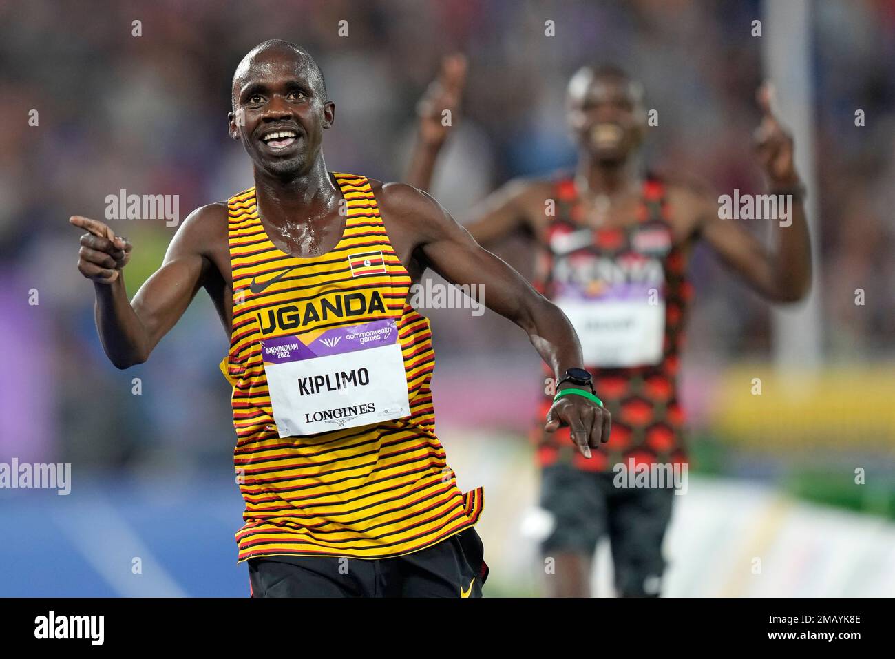 Uganda's Jacob Kiplimo crosses the line to win the gold medal in the ...