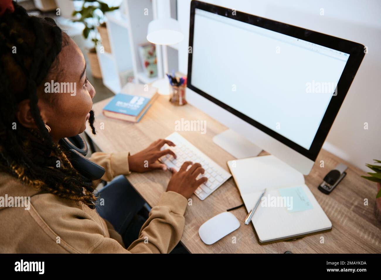 Computer, mockup screen and black woman typing feedback review of ...