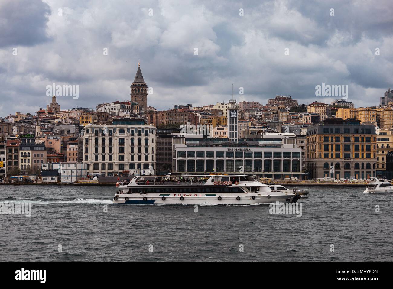 Cityscape of Istanbul. Old city with colored buildings. Eminonu ferry ...