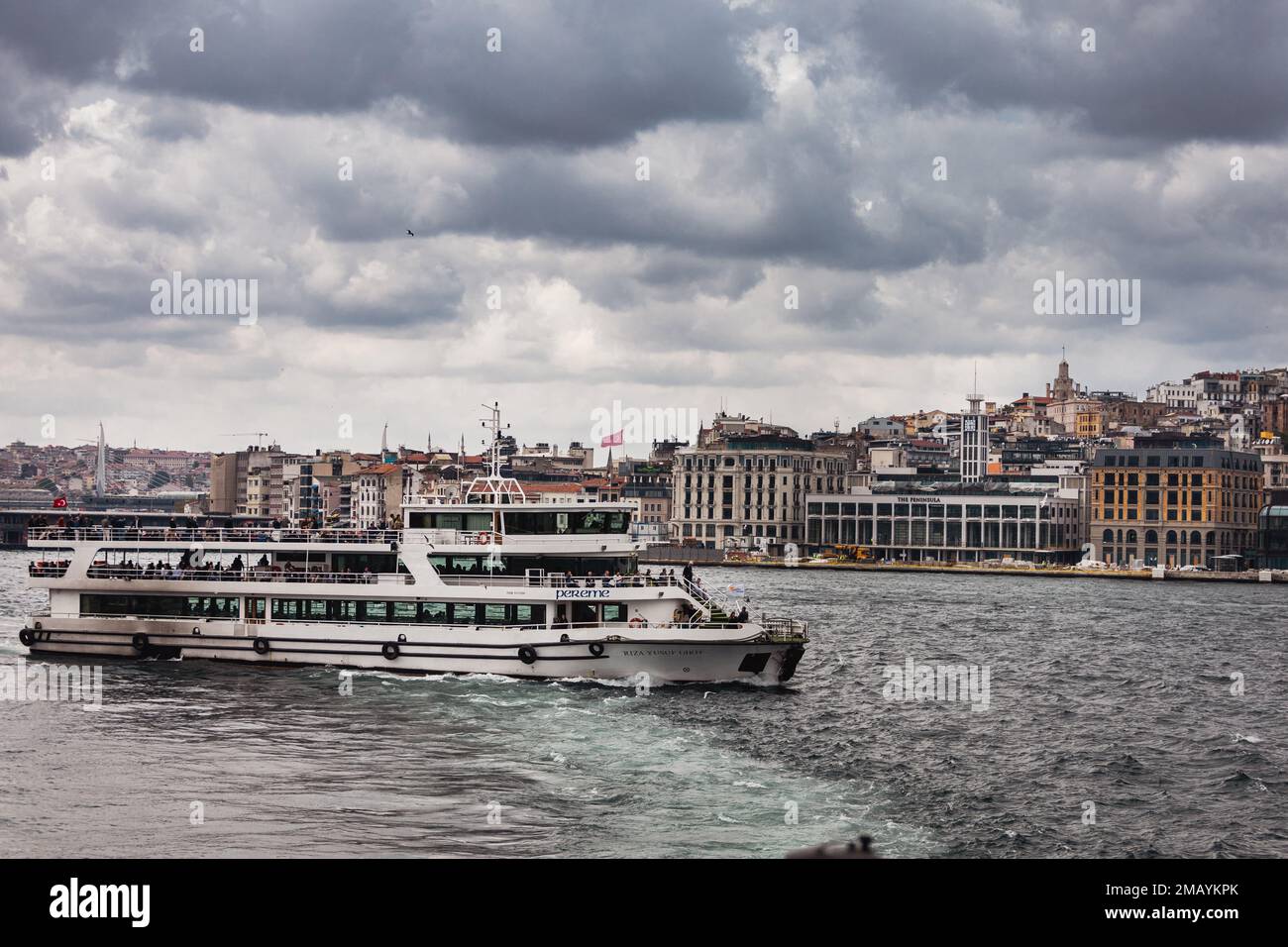 Cityscape of Istanbul. Old city with colored buildings. Eminonu ferry ...