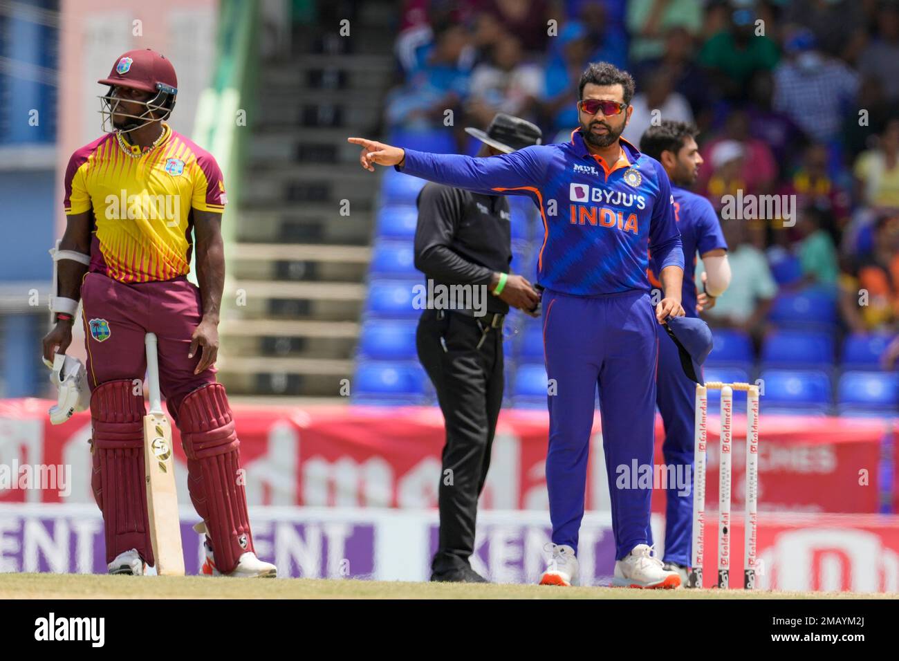 India's captain Rohit Sharma instructs his players during the bating of ... India's captain Rohit Sharma instructs his players during the bating of ...