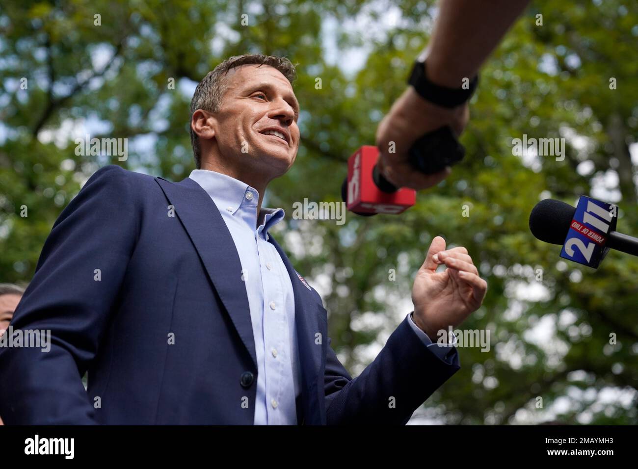 Former Missouri Gov. Eric Greitens speaks to reporters after voting in ...