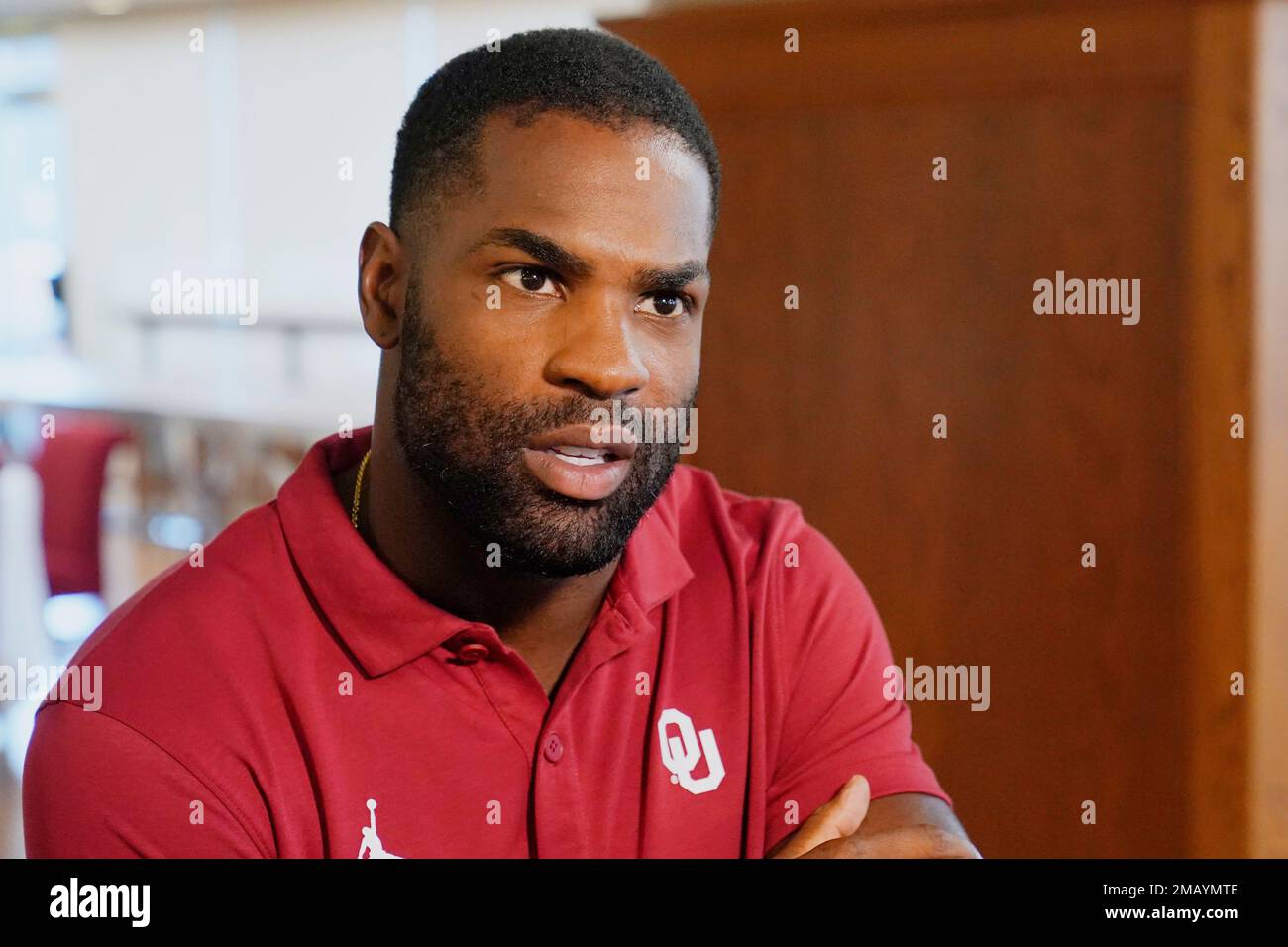 Oklahoma offensive coach DeMarco Murray speaks during an NCAA college ...