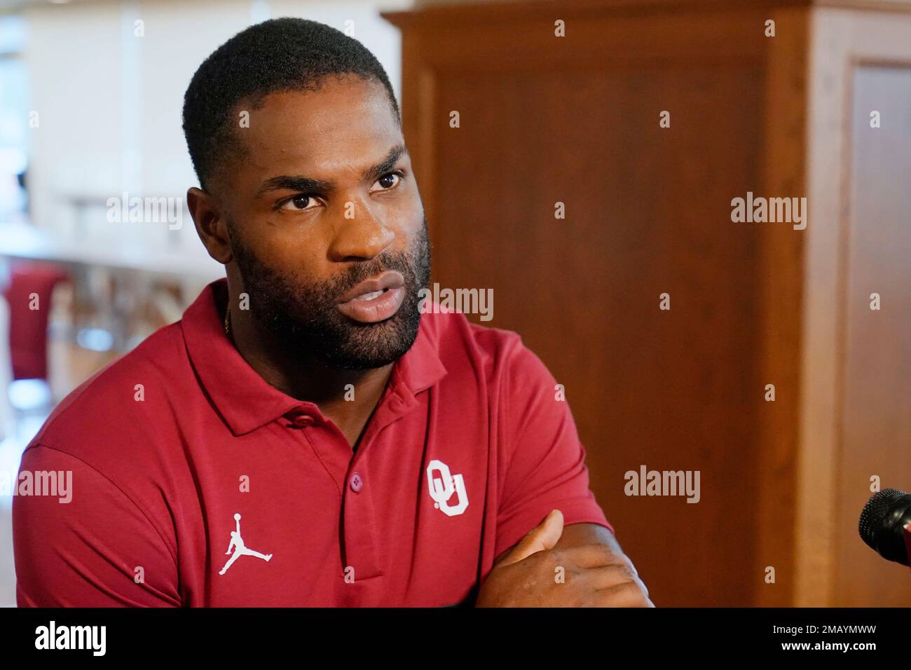 Oklahoma offensive coach DeMarco Murray speaks during an NCAA college ...