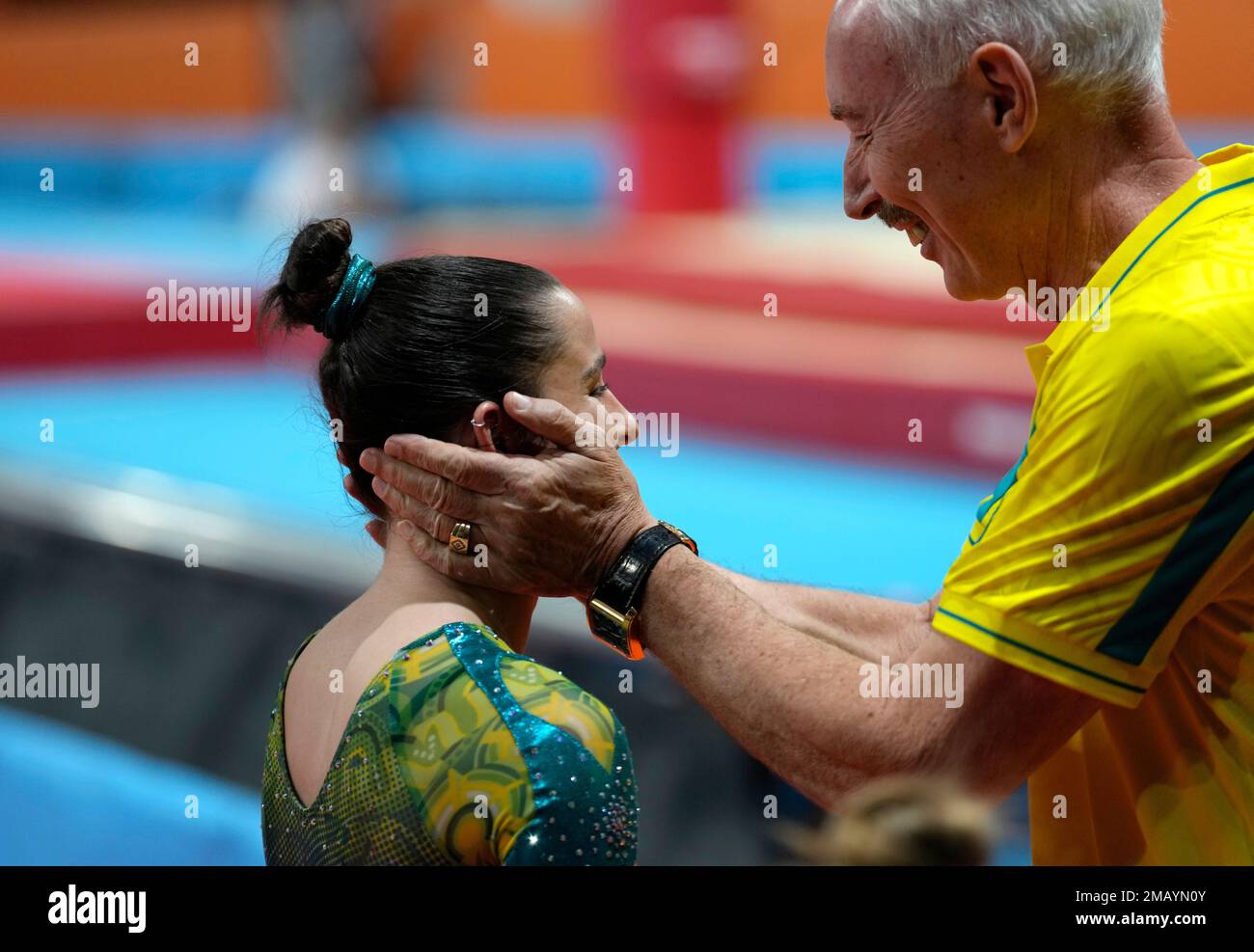 Kate McDonald of Team Australia is congratulated after competing in the ...
