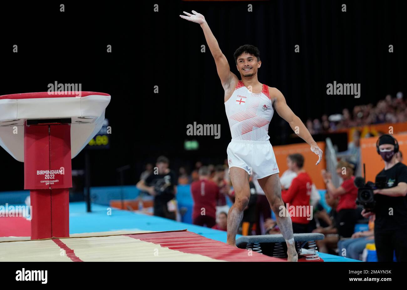 Jake Jarman of Team England waves after completing his vault during the ...