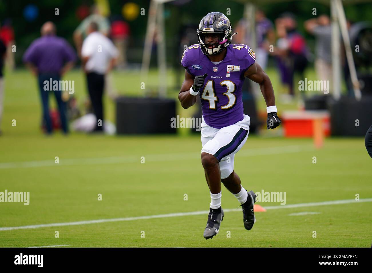 Baltimore Ravens running back Justice Hill runs a drill during the team ...