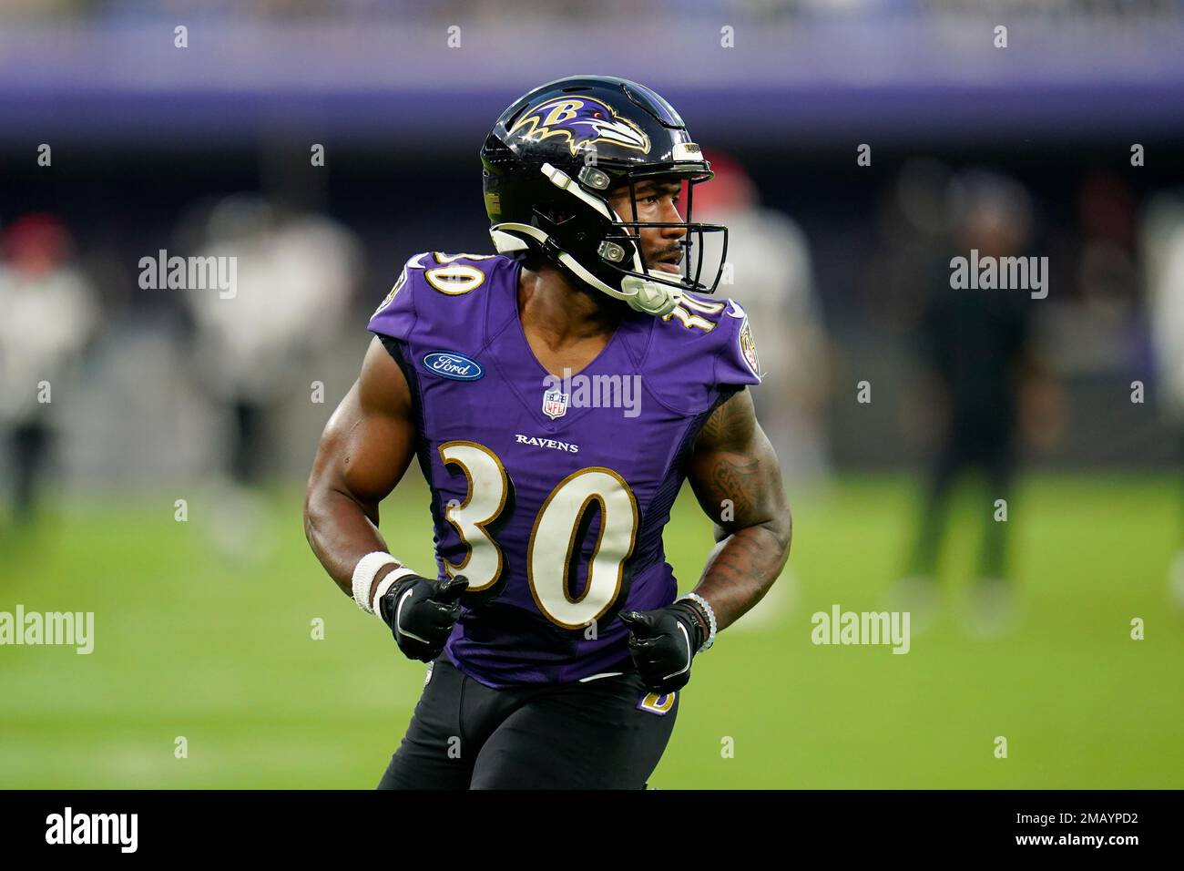Baltimore Ravens running back Tyler Badie works out during the team's ...