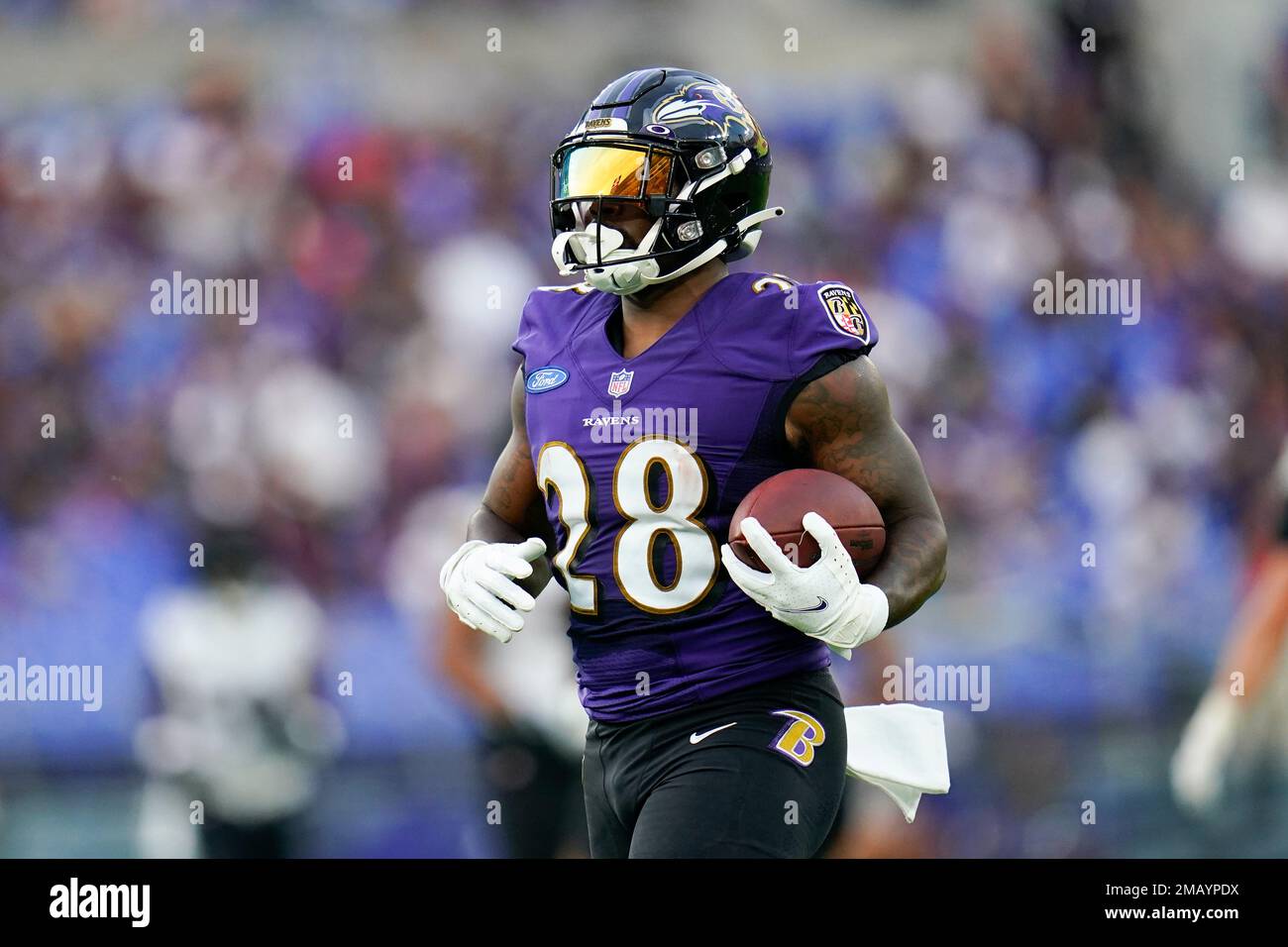 Baltimore Ravens running back Mike Davis works out during the team's ...