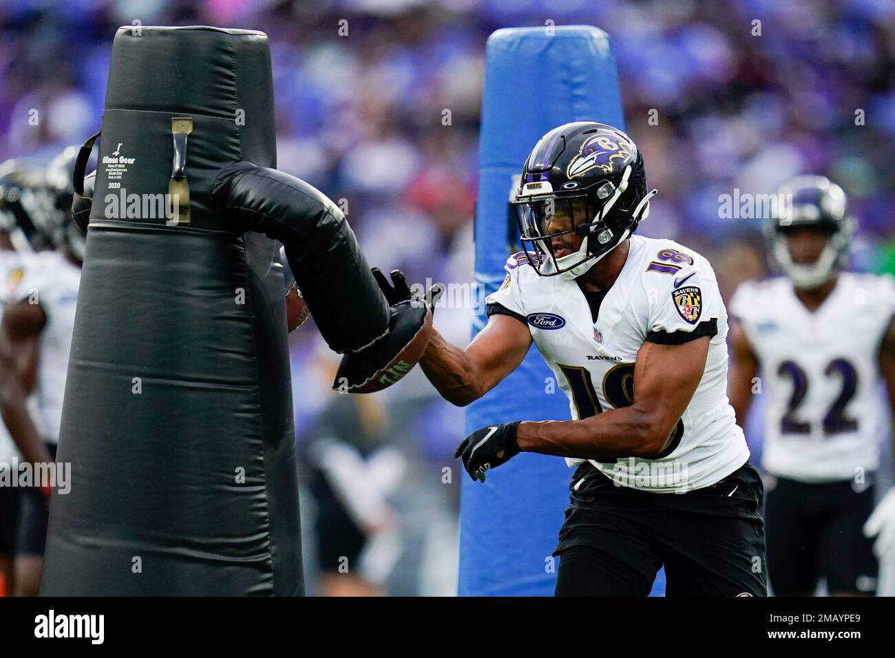 Baltimore Ravens cornerback Kyle Fuller works out during the team's NFL ...