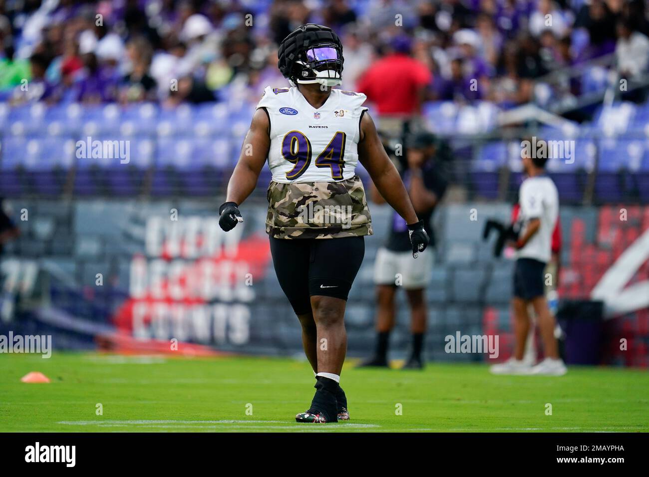 Baltimore Ravens nose tackle Isaiah Mack works out during the team's ...