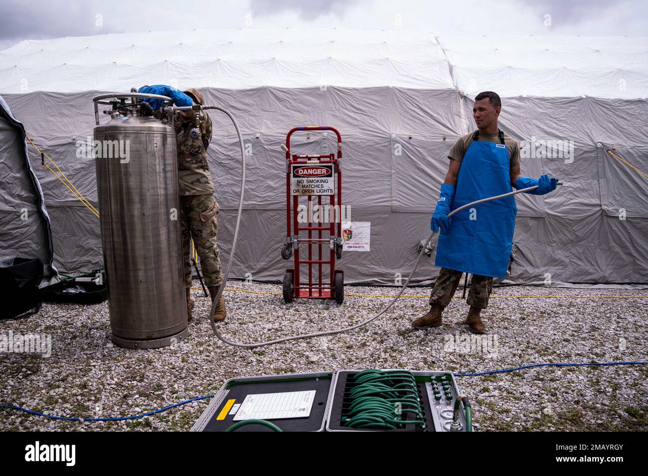 Airman 1st Class Lindsey Roberts (left) and Staff Sgt. Jeremiah Stewart ...
