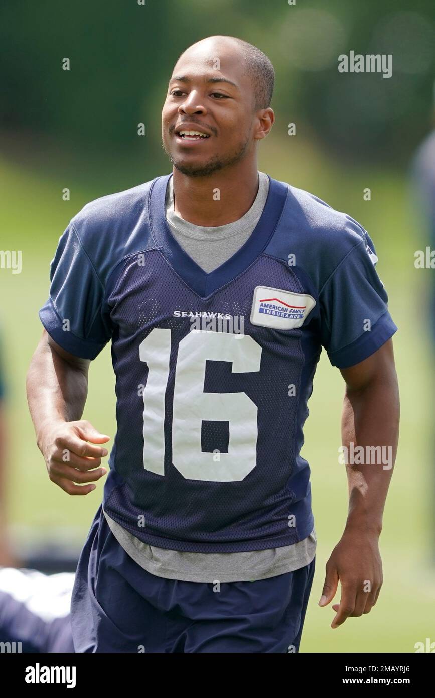 Seattle Seahawks wide receiver Tyler Lockett (16) jogs on the field ...