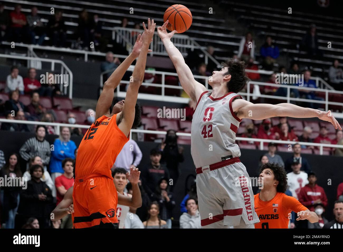 Oregon State forward Michael Rataj, left, and Stanford forward Maxime ...