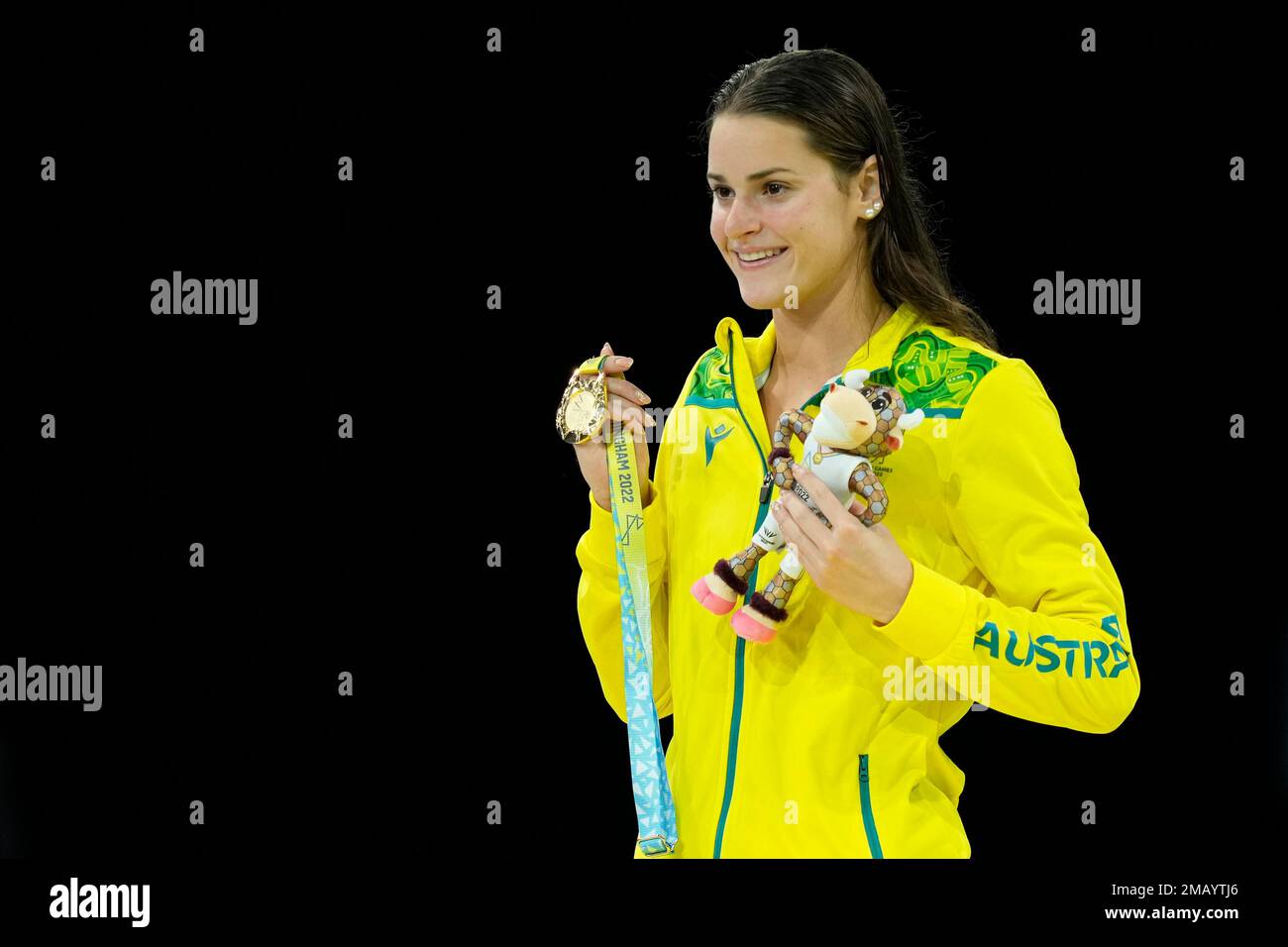 Kaylee McKeown of Australia poses after winning the gold medal in the ...