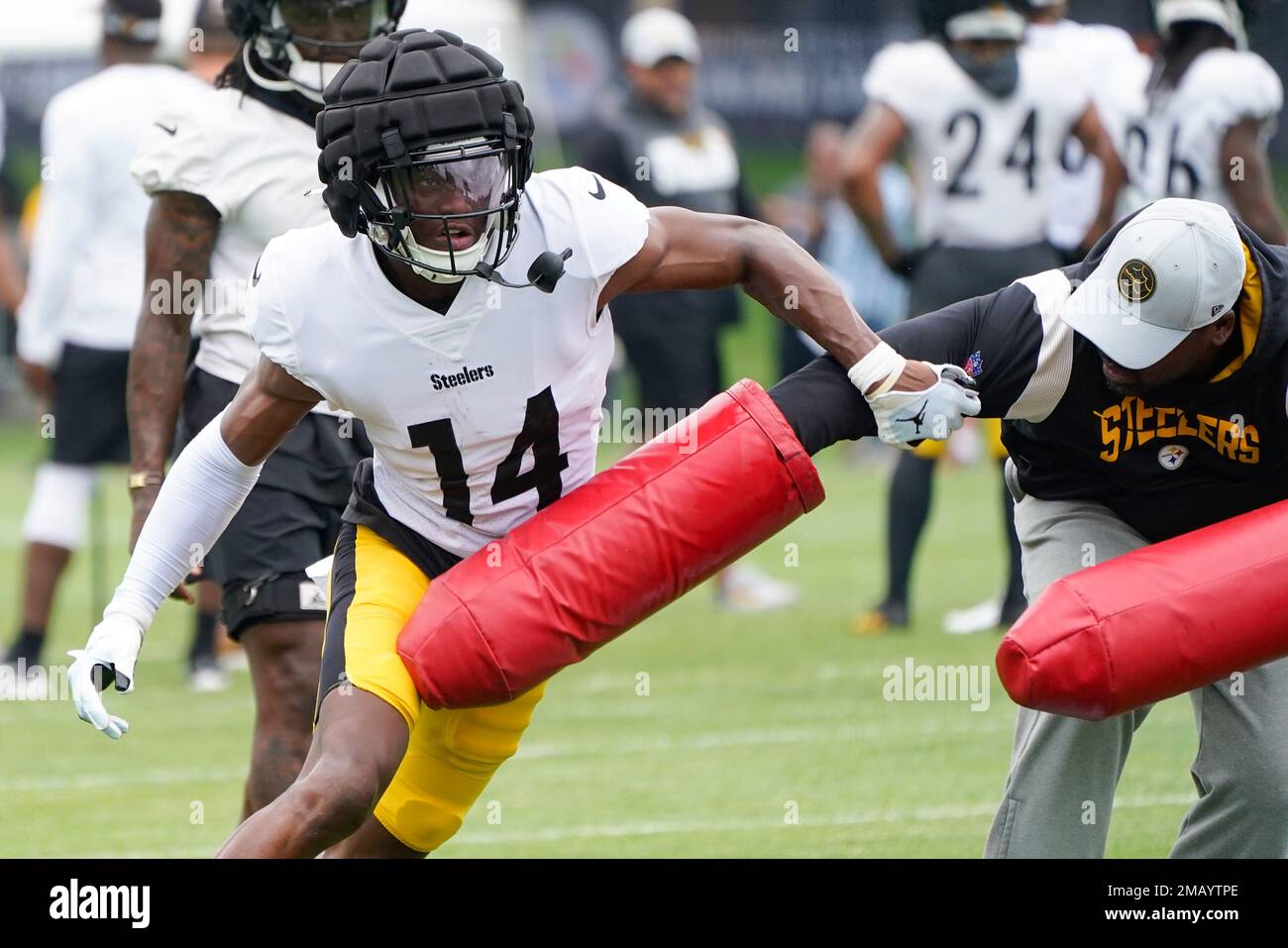 Pittsburgh Steelers wide receiver George Perkins (14) goes through ...