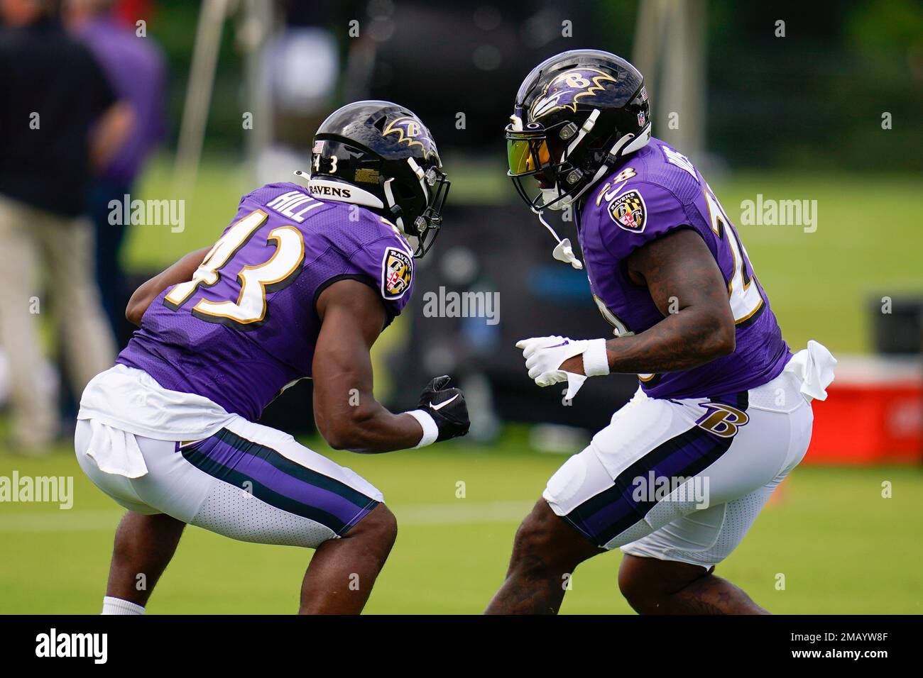 Baltimore Ravens running back Justice Hill (43) and running back Mike ...