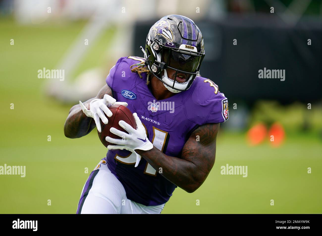 Baltimore Ravens running back Corey Clement carries the ball during the ...