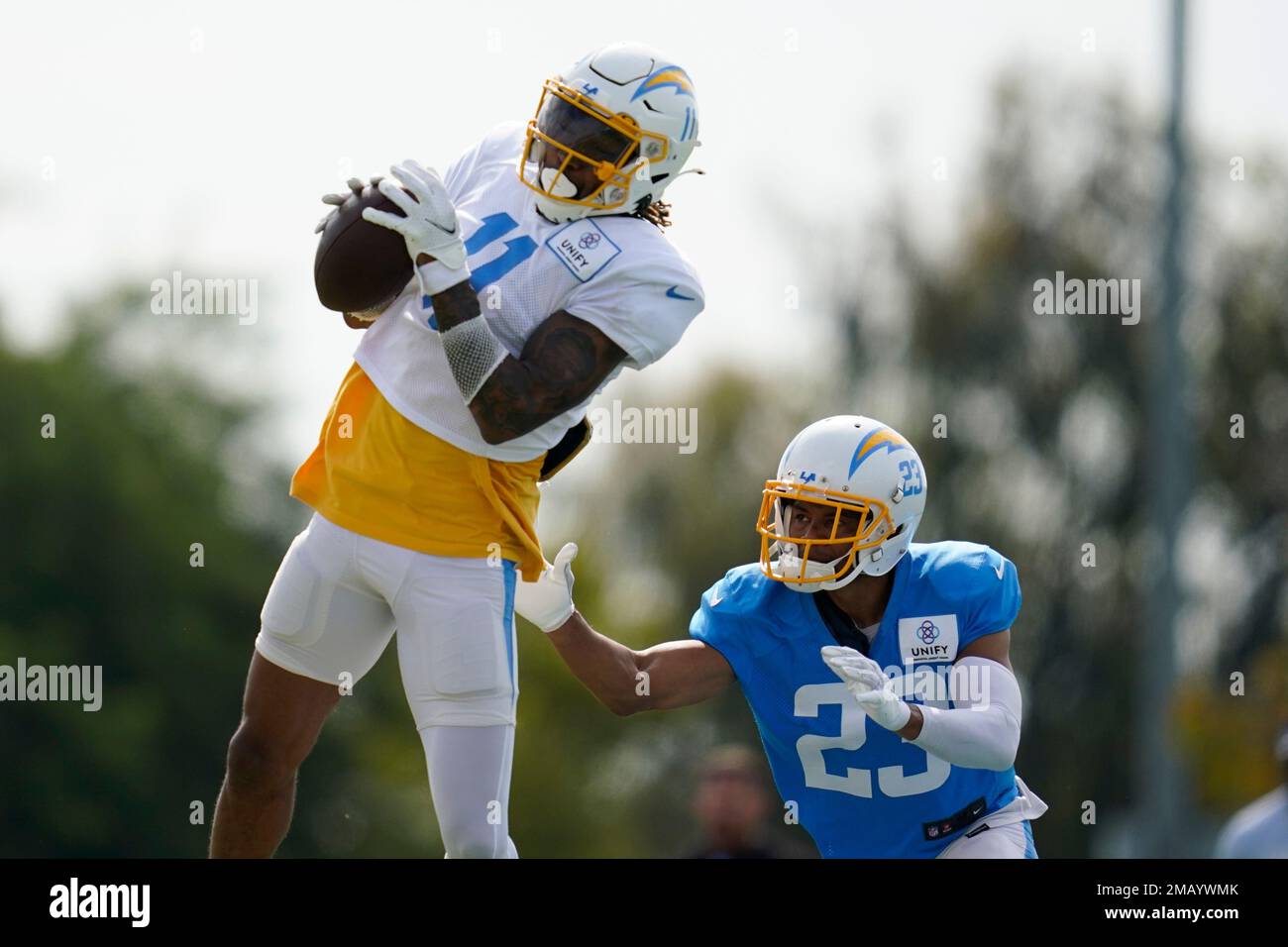 Los Angeles Chargers wide receiver Jason Moore Jr. (11) and cornerback ...