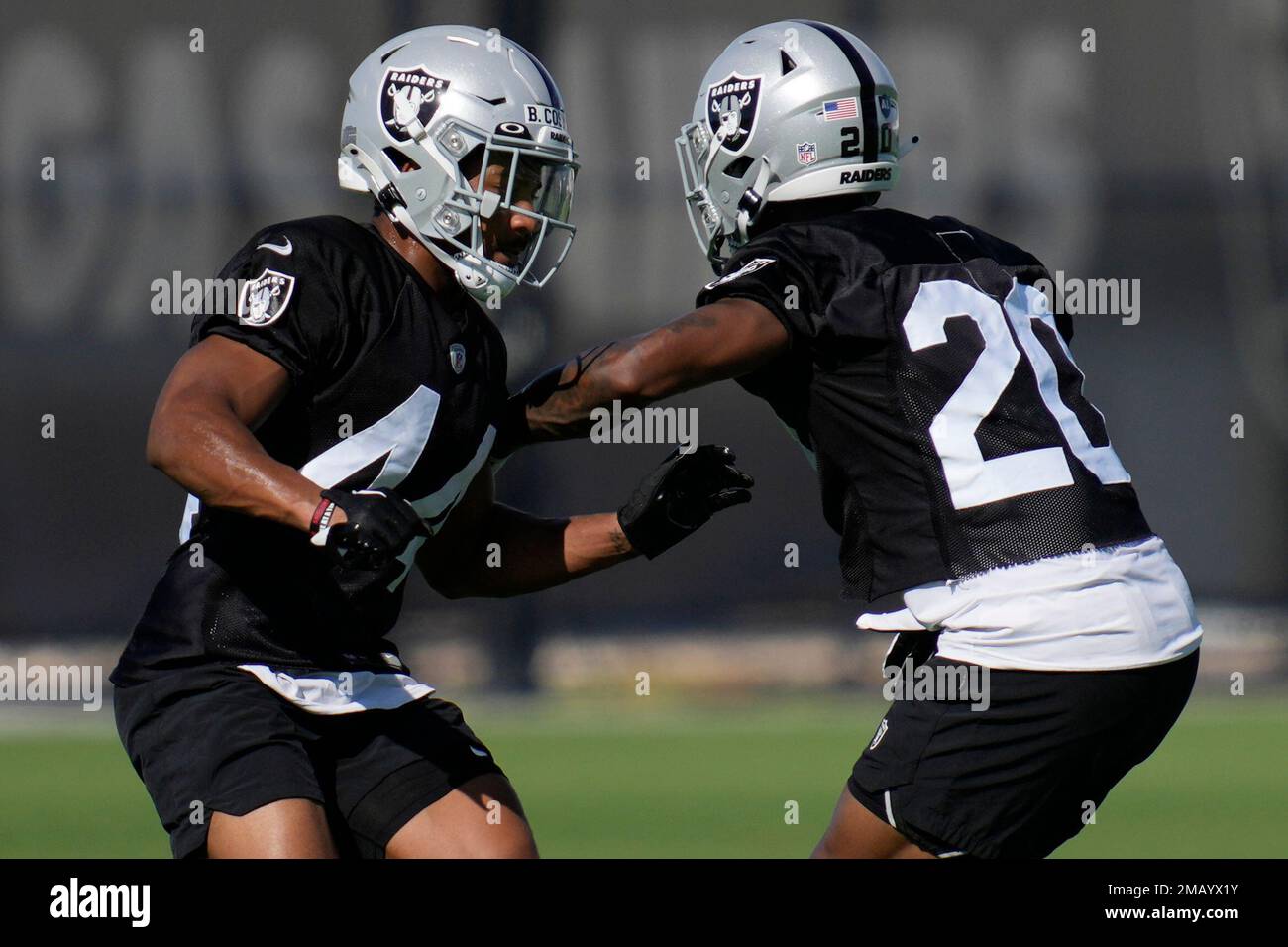 Las Vegas Raiders' Bryce Cosby, left, and Darius Phillips practice ...