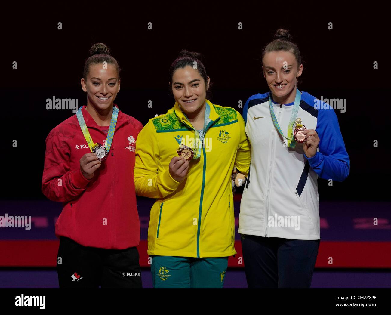 Georgia Godwin of Team Australia, Laurie Denommee of Team Canada and ...