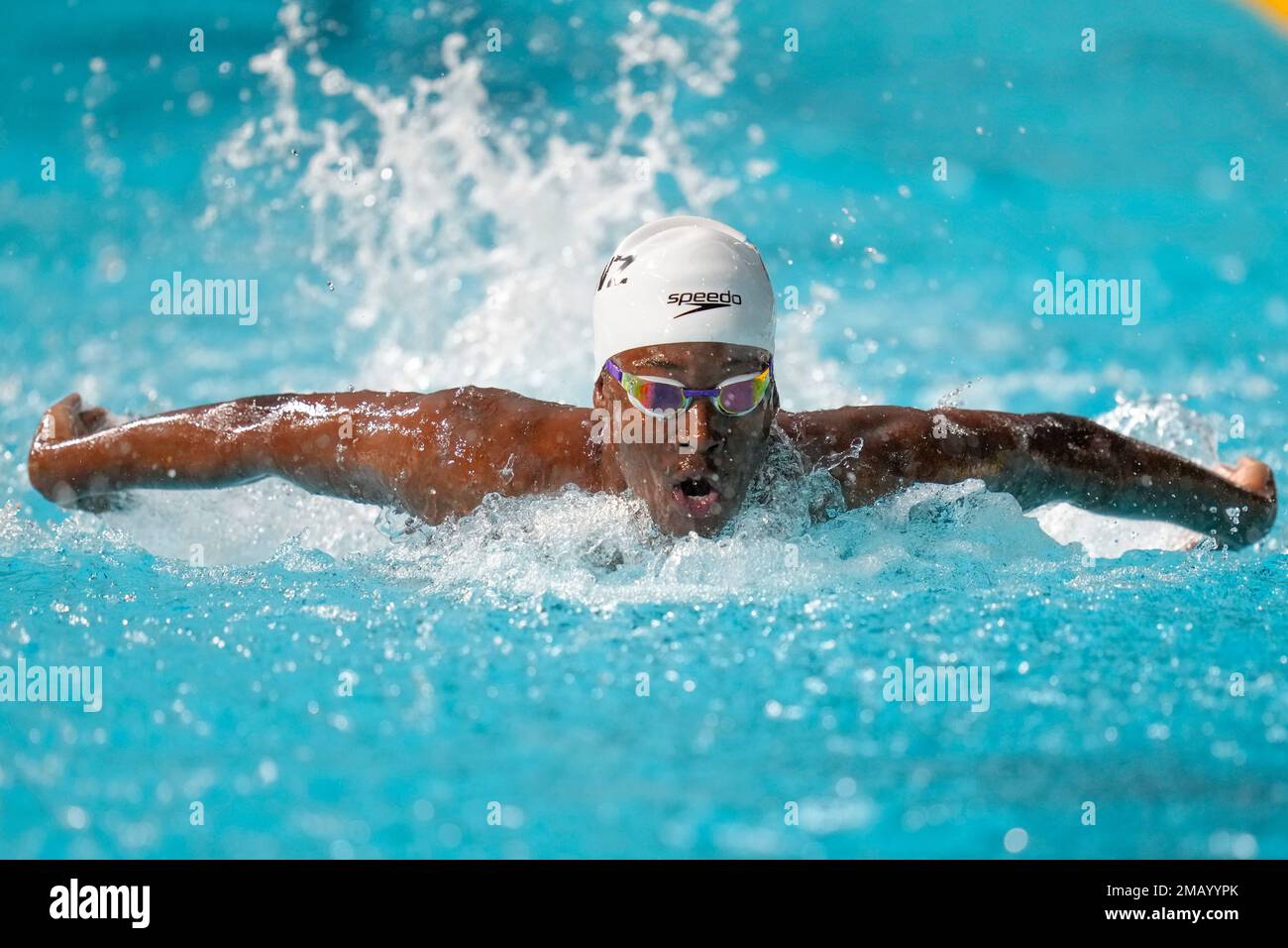 Simanga Dlamini of Eswatini swims in the men's 100m butterfly heat ...