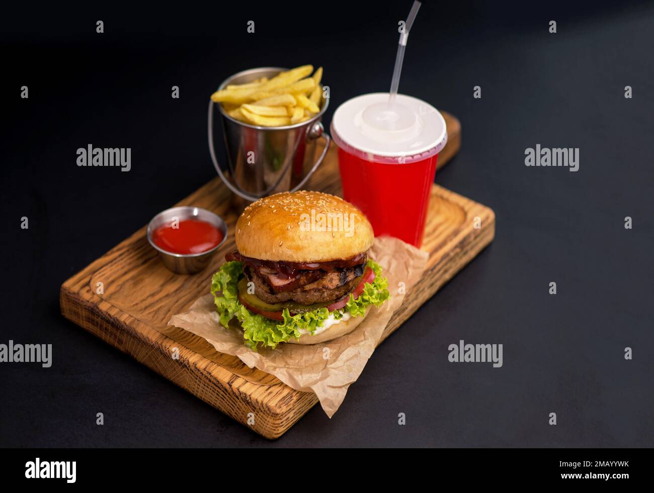Classic burgers with becon, meat, cheese, onion, tomato and cheese and ...