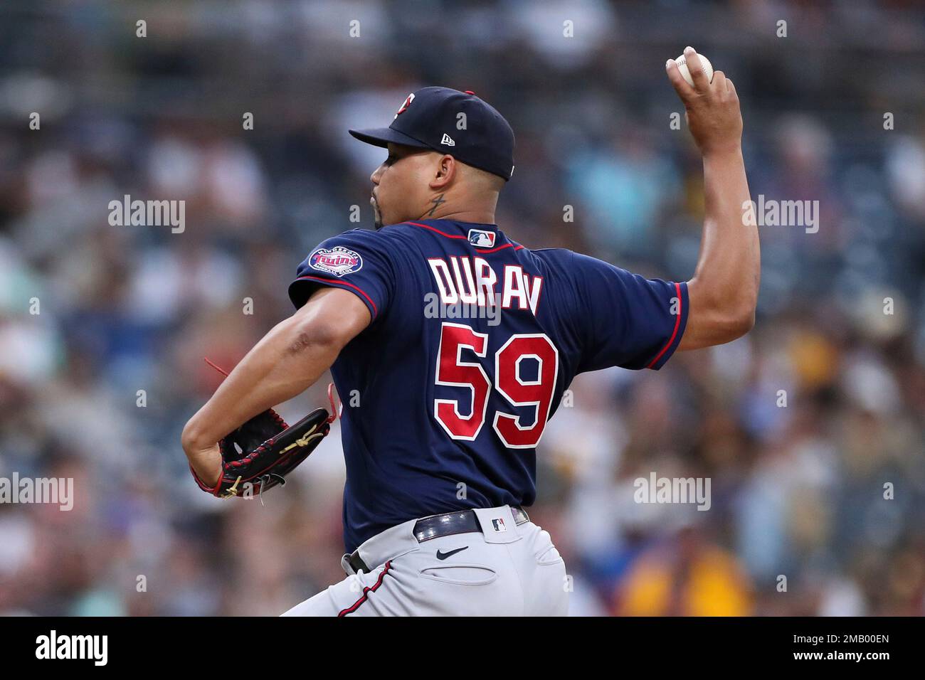 Minnesota Twins relief pitcher Jhoan Duran works against the San Diego ...
