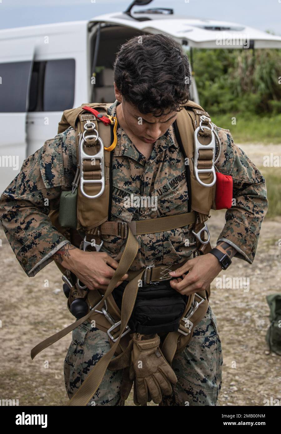 U.S. Marine Corps Cpl. Benjamin Nutting, a parachute rigger with 3rd ...