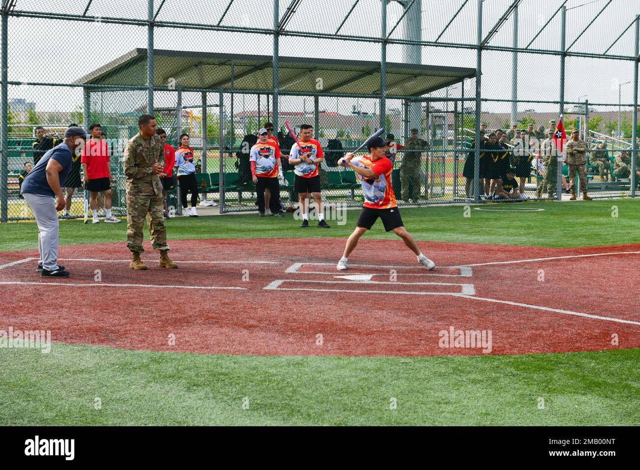 Combined teams of KATUSA and U.S. Soldiers participate in a softball ...
