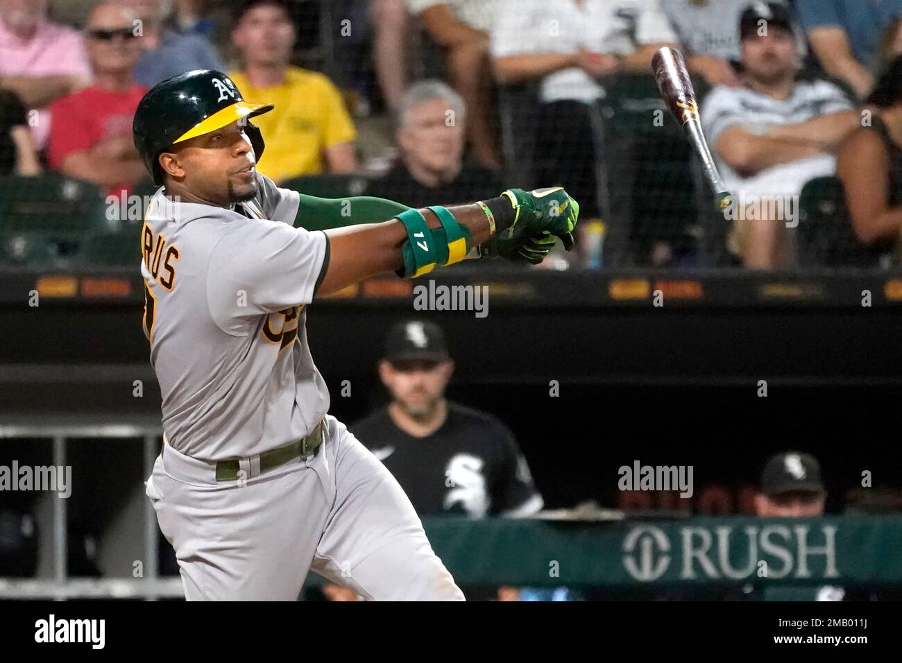 Oakland Athletics' Elvis Andrus loses control of his bat during a ...