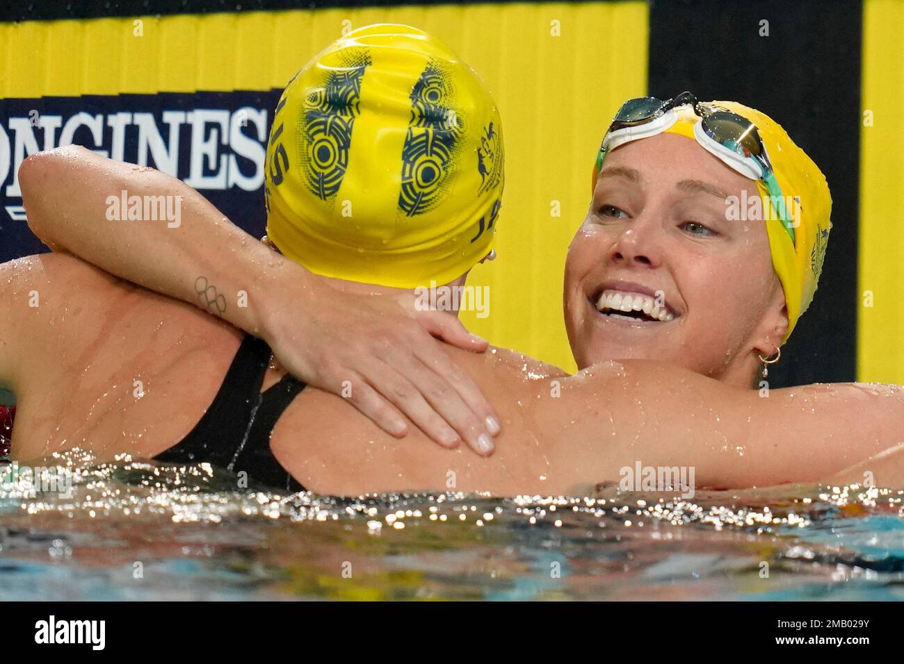 Australia's Emma McKeon, right celebrates with teammate Meg Harris ...