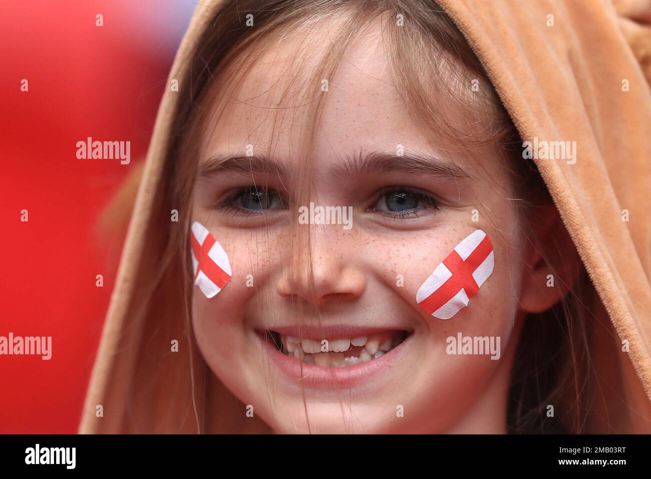 An England fan smiles before the Women's Euro 2022 final soccer match ...