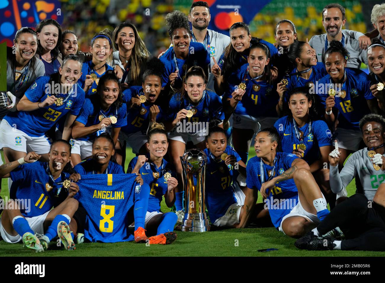 Brazil's players pose for a picture as they celebrate winning the women ...