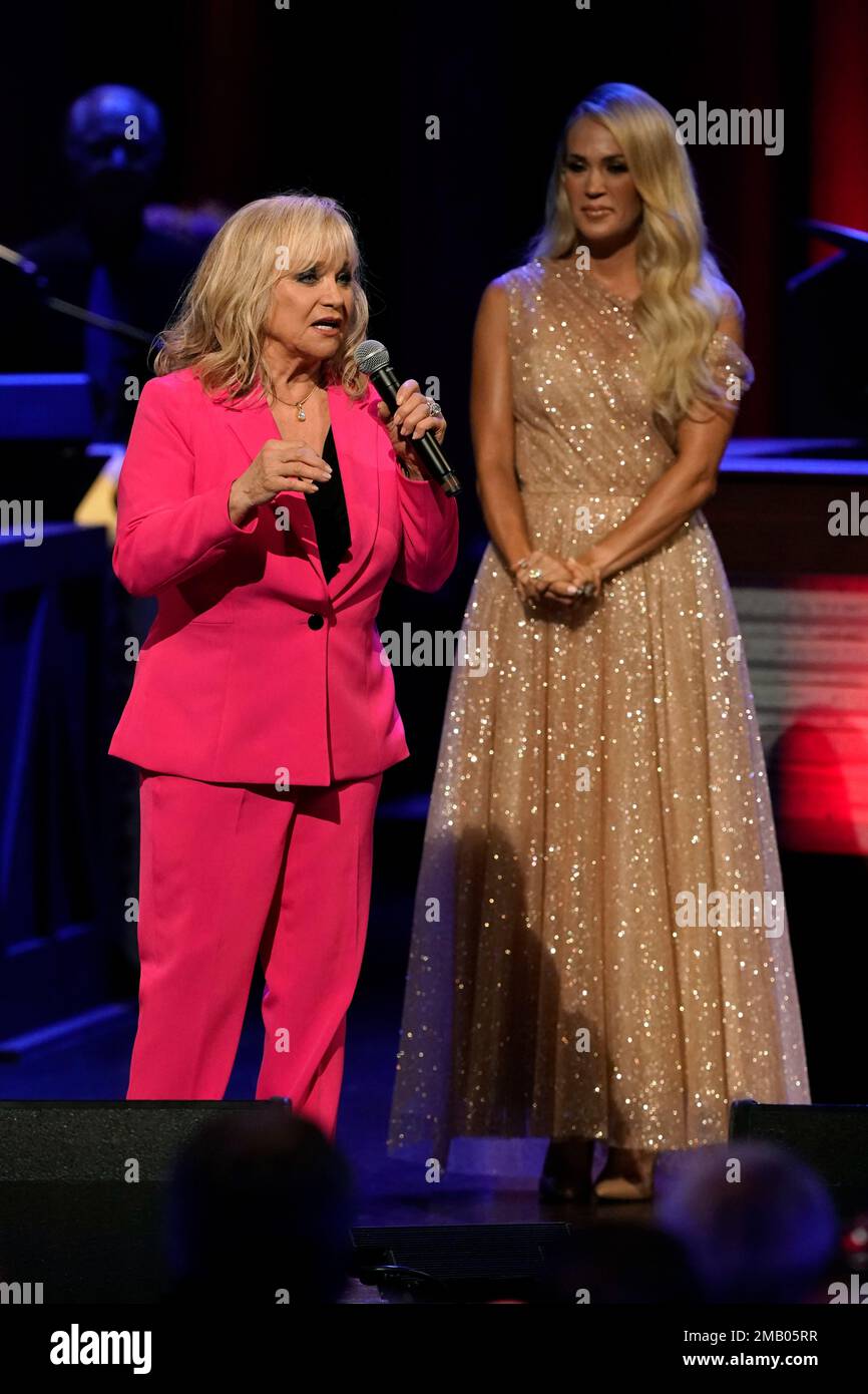 Barbara Mandrell, left, speaks as she shares the stage with Carrie ...