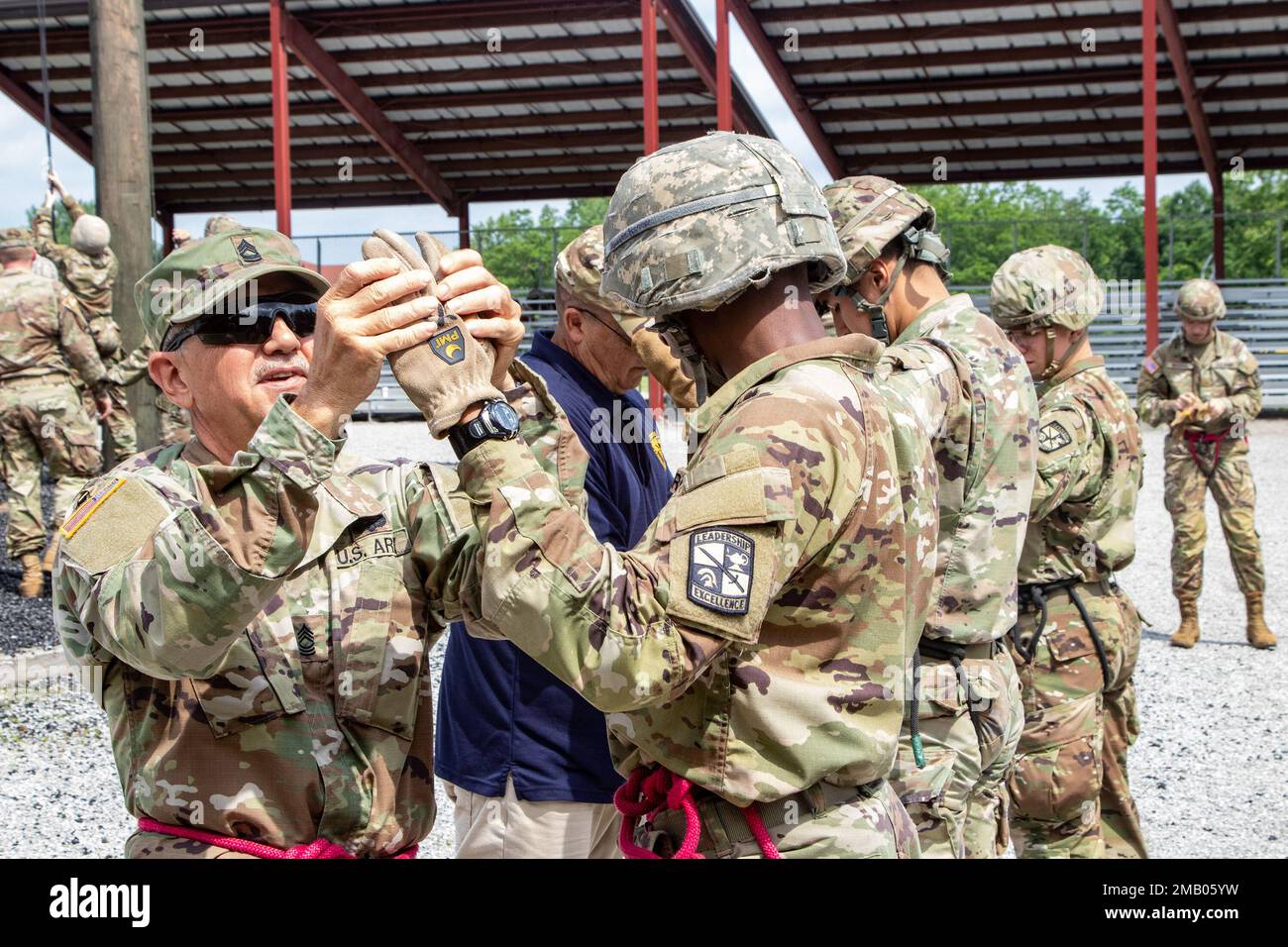 Master Sgt. Jeffrey Tinsley, left, a rappel master witj Company B ...
