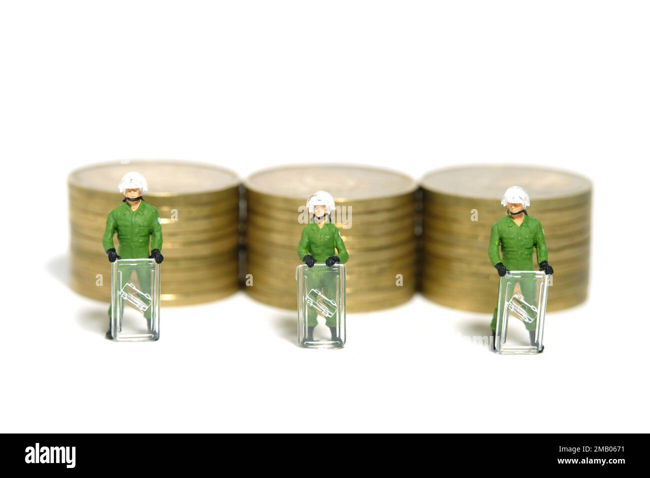 Miniature people toy figure photography. Money security protection ...