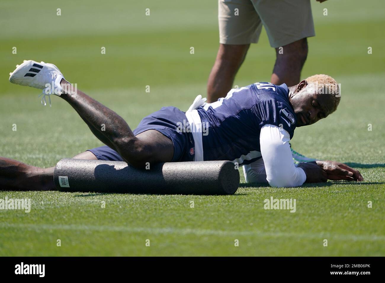 Seattle Seahawks wide receiver DK Metcalf uses a foam roller on the ...