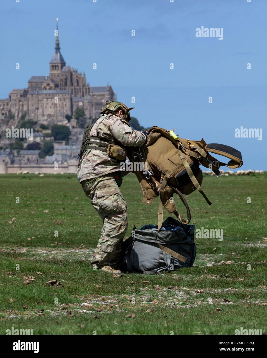 A U.S. Army Special Operations Soldier tosses his pack after landing ...